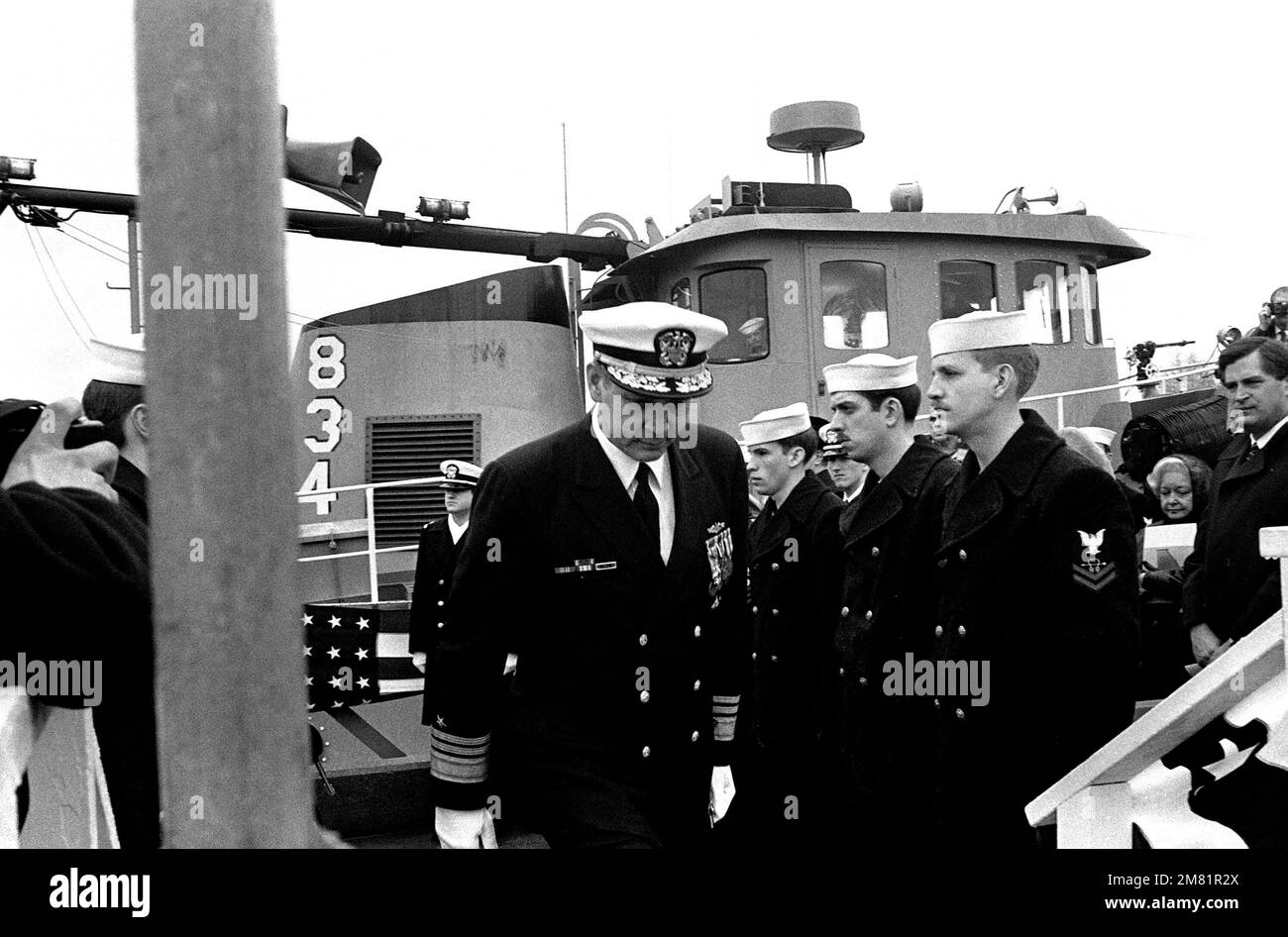 Vice Admiral Nils R. Thunman arrives at the commissioning ceremony for ...