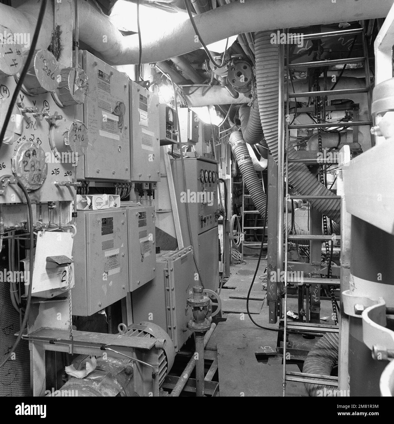 An interior view of auxiliary machine room No. 1 on the guided missile ...