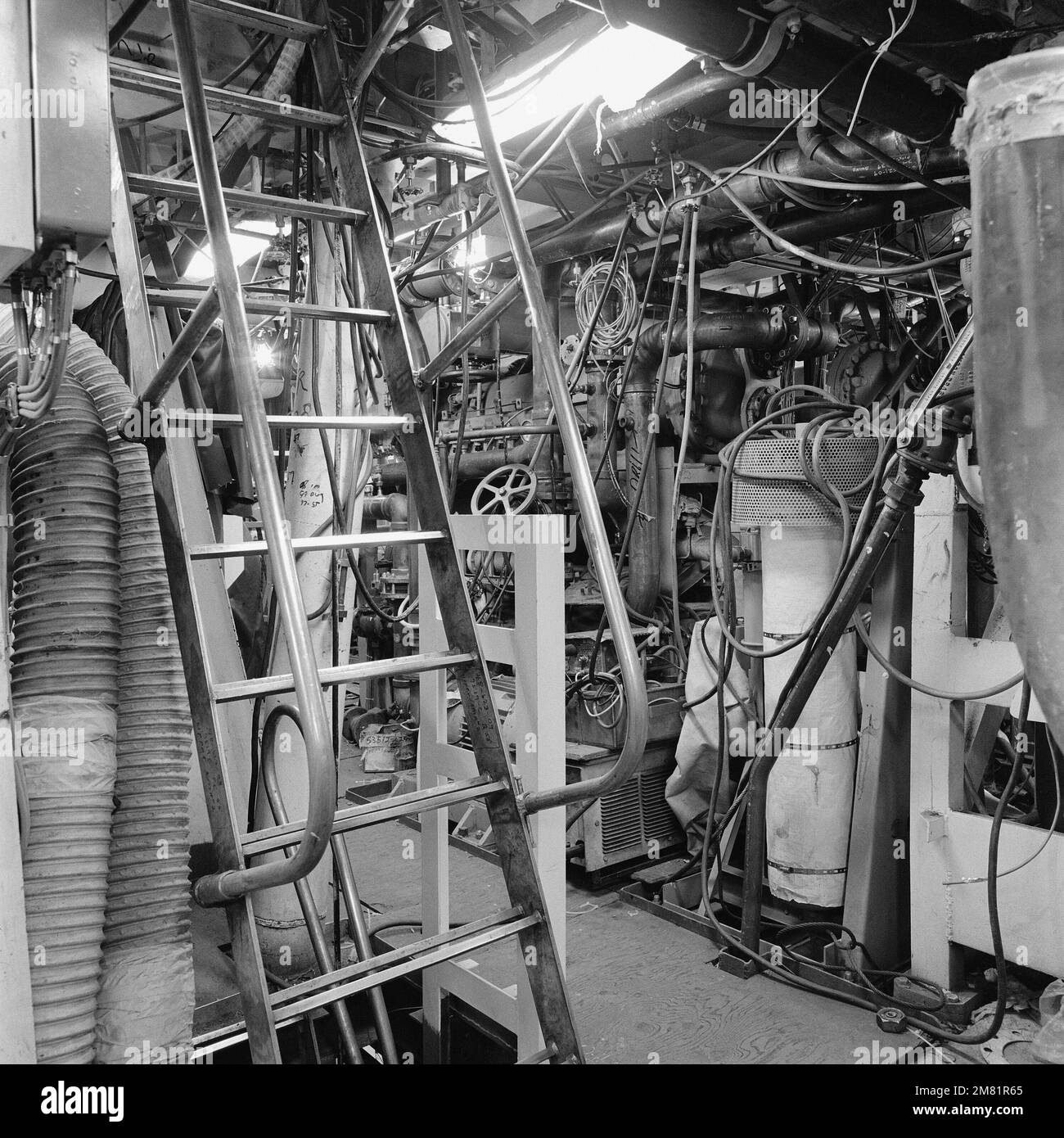 An interior view of auxiliary machine room No. 2 on the guided missile ...