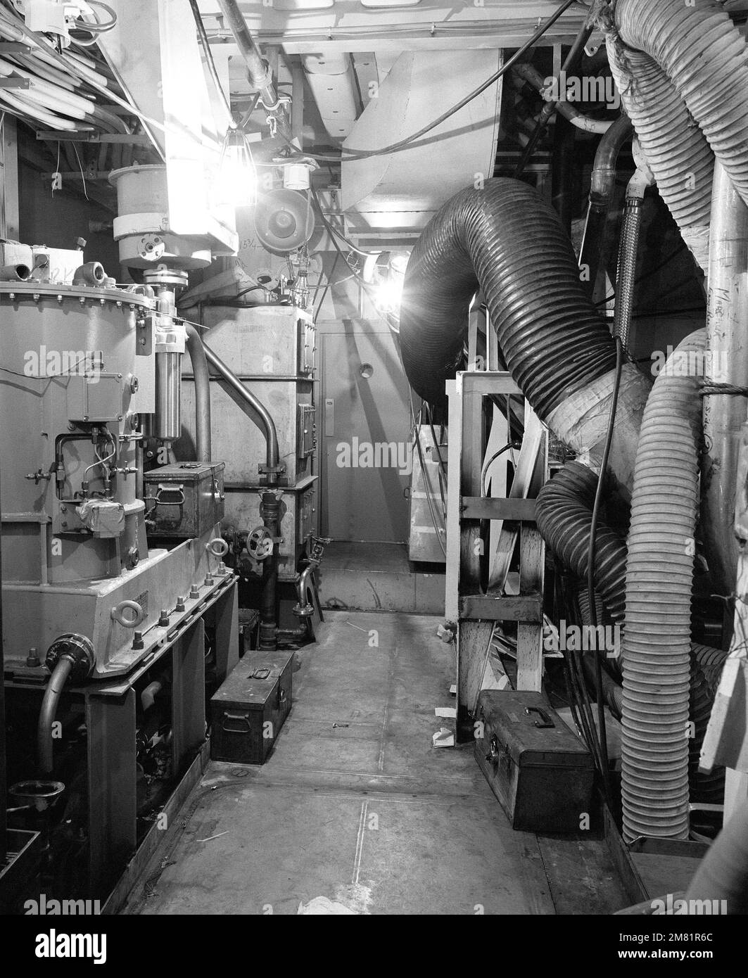 An interior view of the main engine room on the guided missile frigate ...