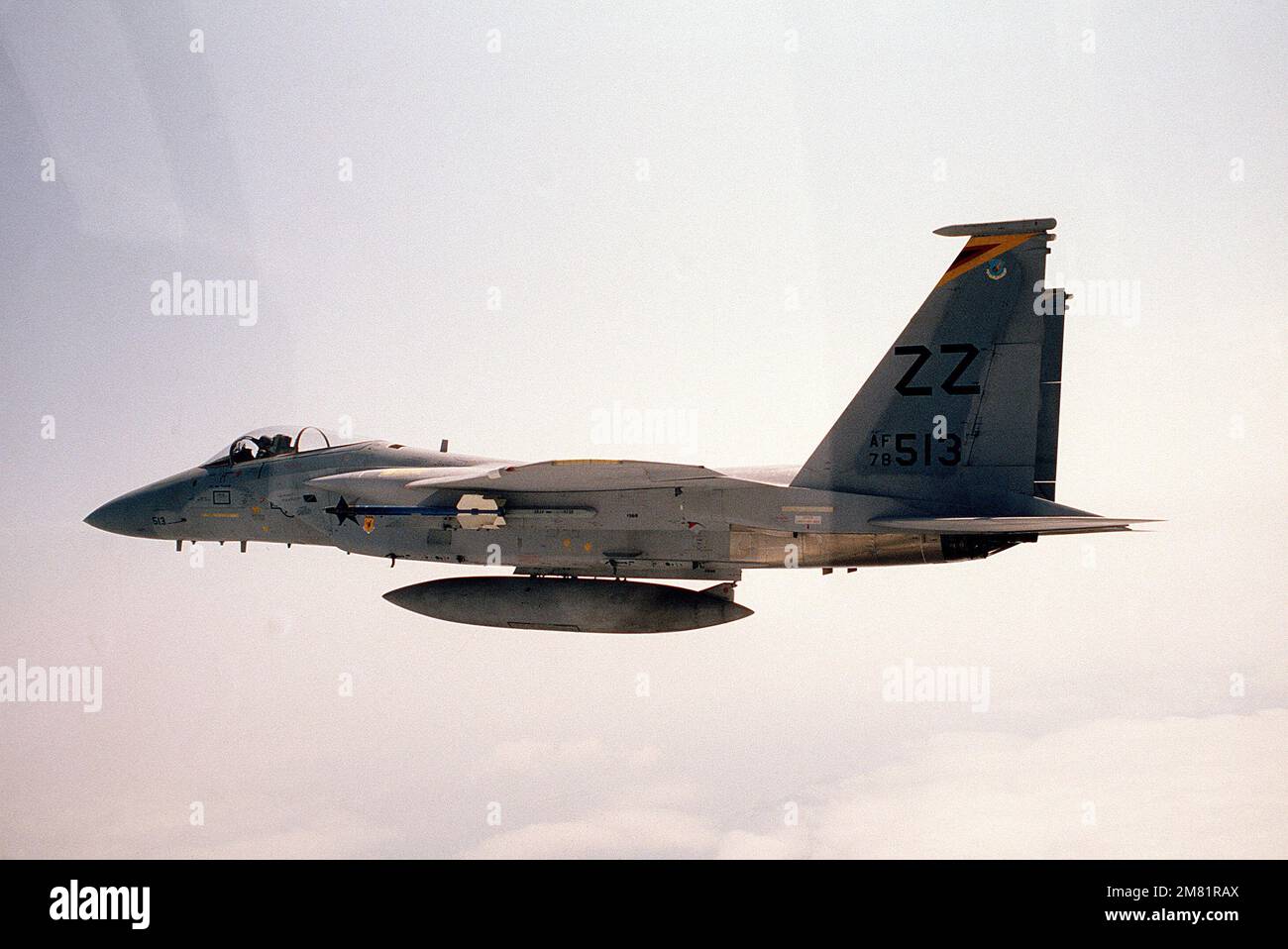 An air-to-air left side view of an F-15 Eagle aircraft assigned to the ...