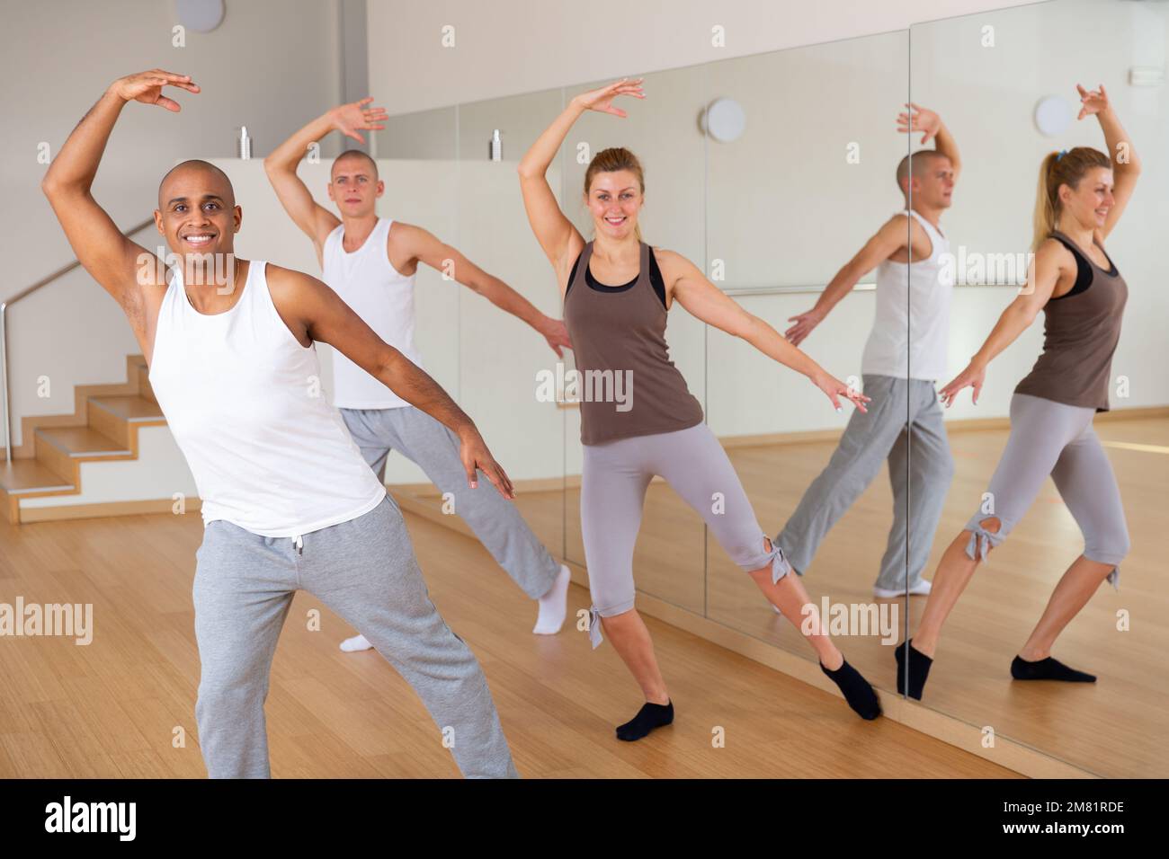 Man dancing at group lesson in studio Stock Photo - Alamy
