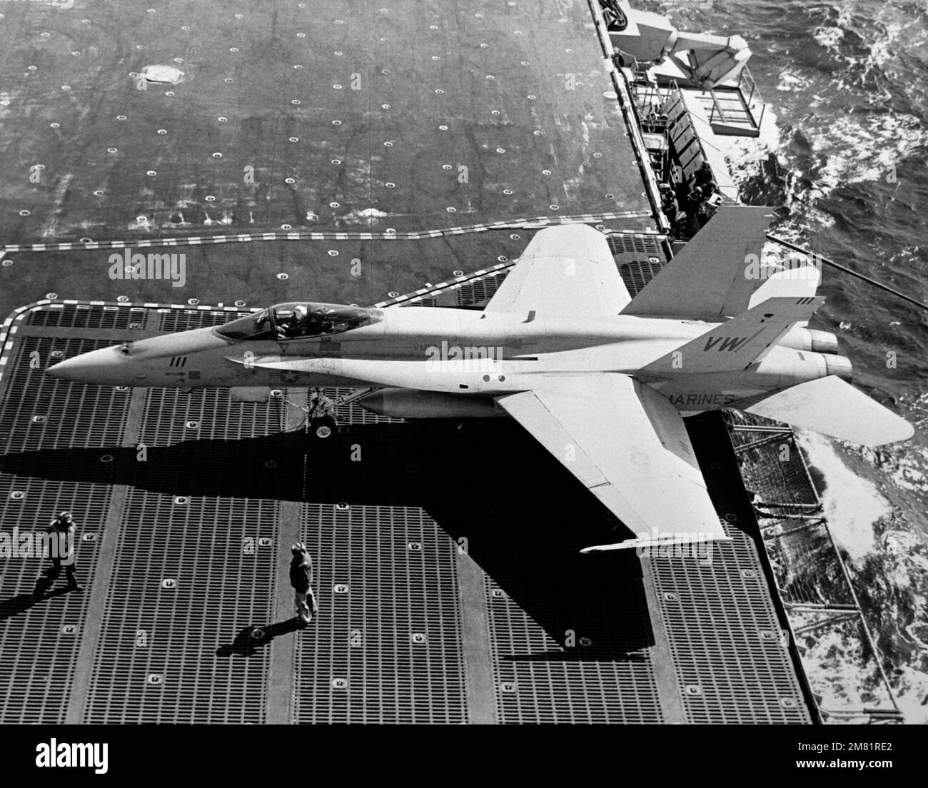 Elevated left side view of an F/A-18 Hornet aircraft assigned to Marine ...