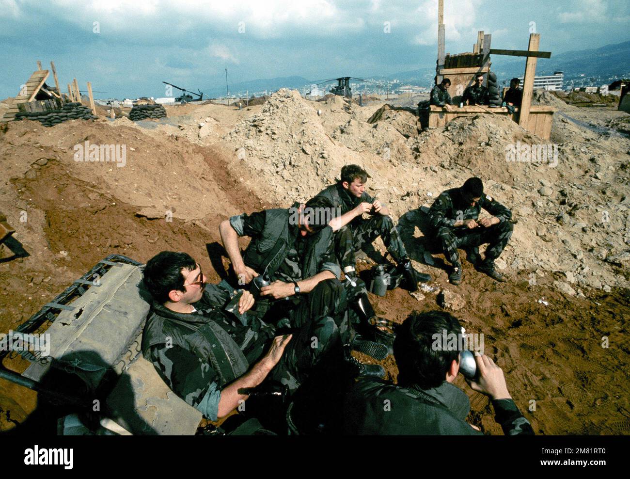 Members of the Atlantic Fleet Combat Camera Crew dine on meal ready-to ...