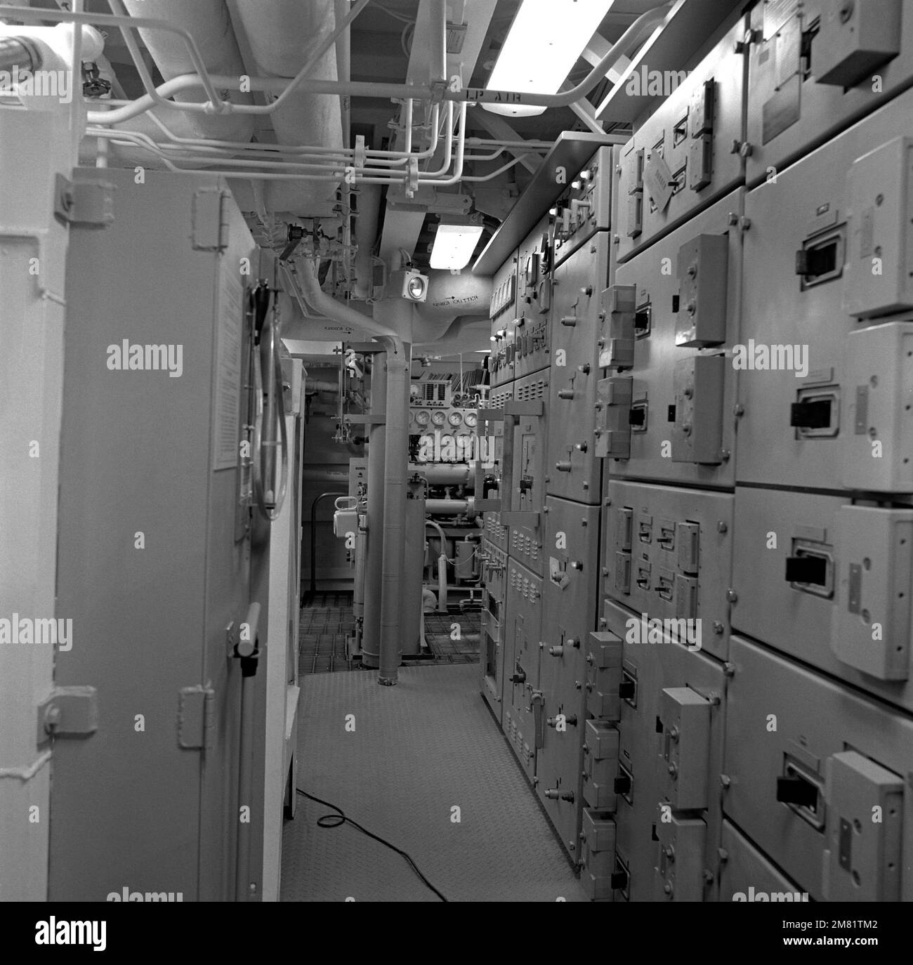 The No. 2 upper level auxiliary machinery room aboard the guided ...