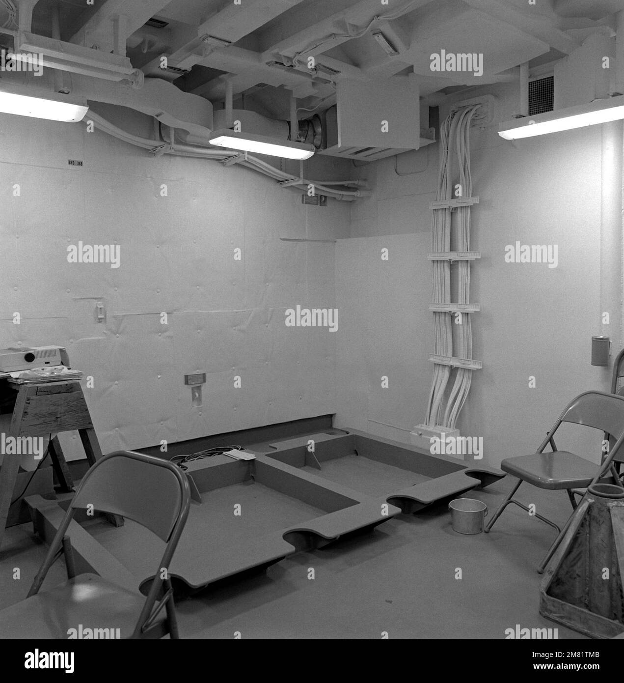 The helicopter haul-down and traverse machinery room aboard the guided ...