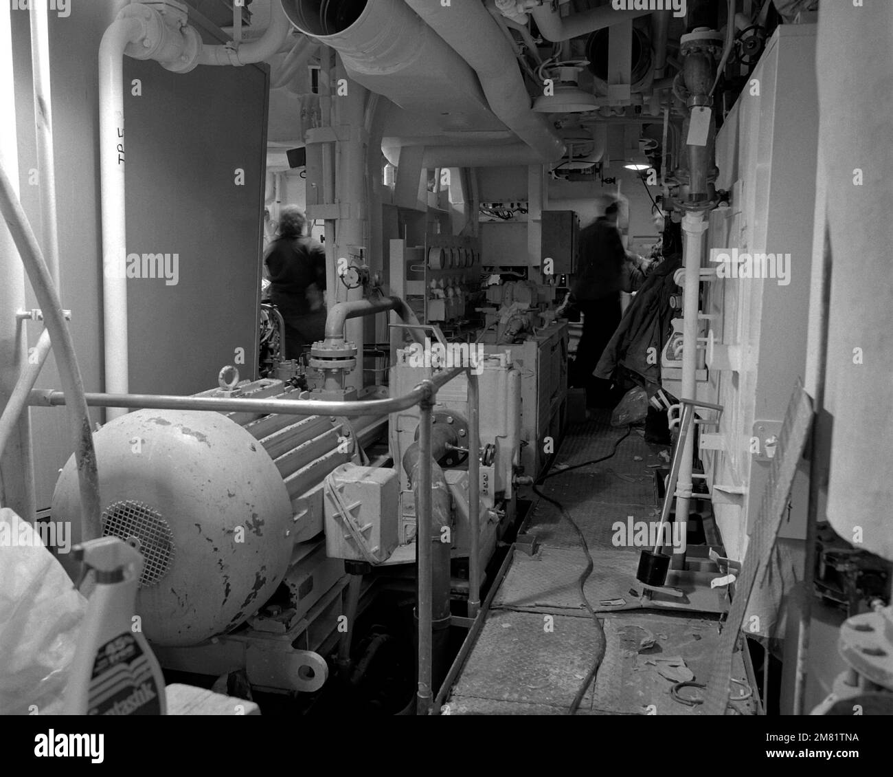 The lower level engine room aboard the guided missile frigate ROBERT G ...