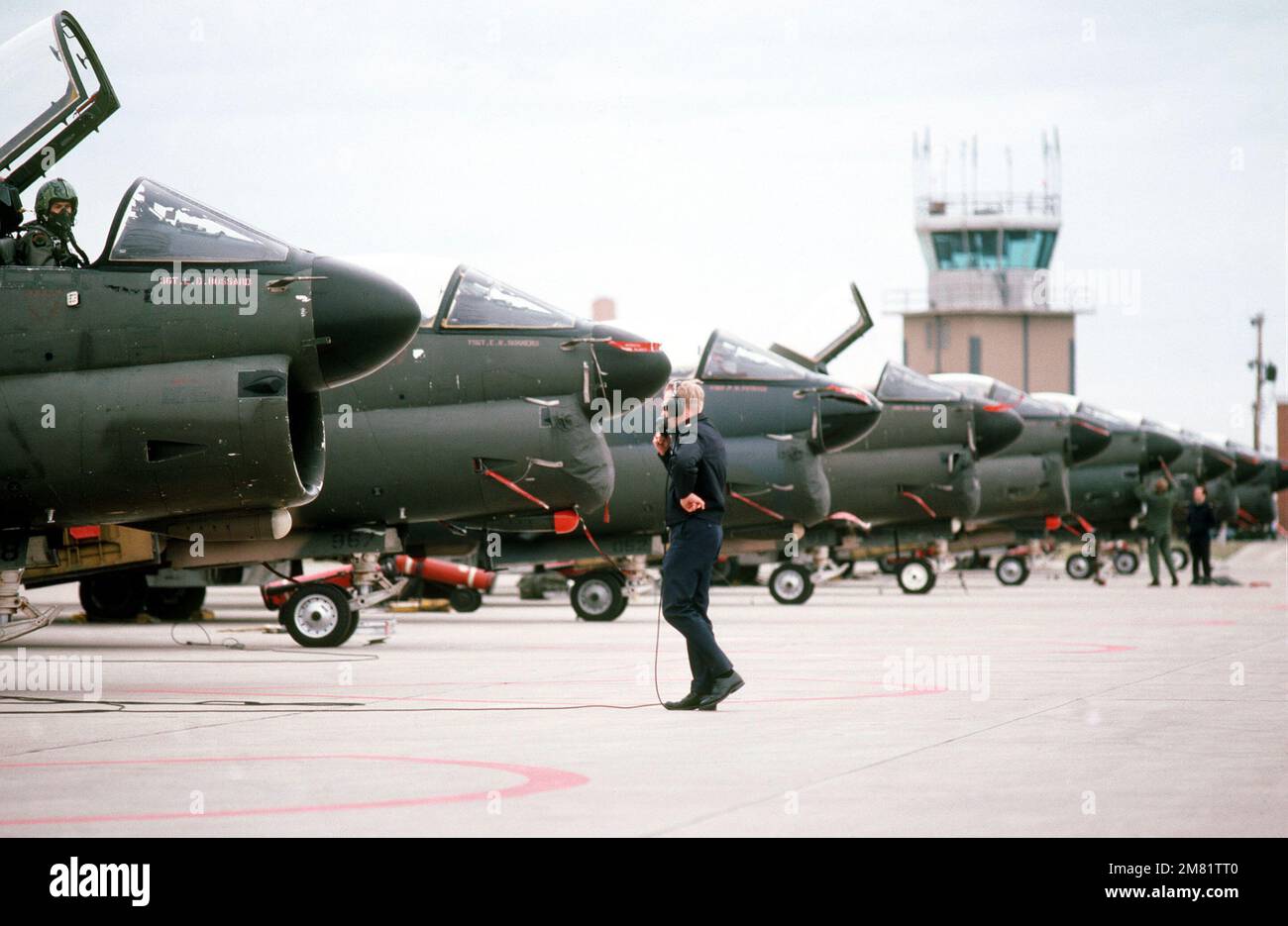 A right front view of an A-7D Corsair II aircraft on the flight line at ...