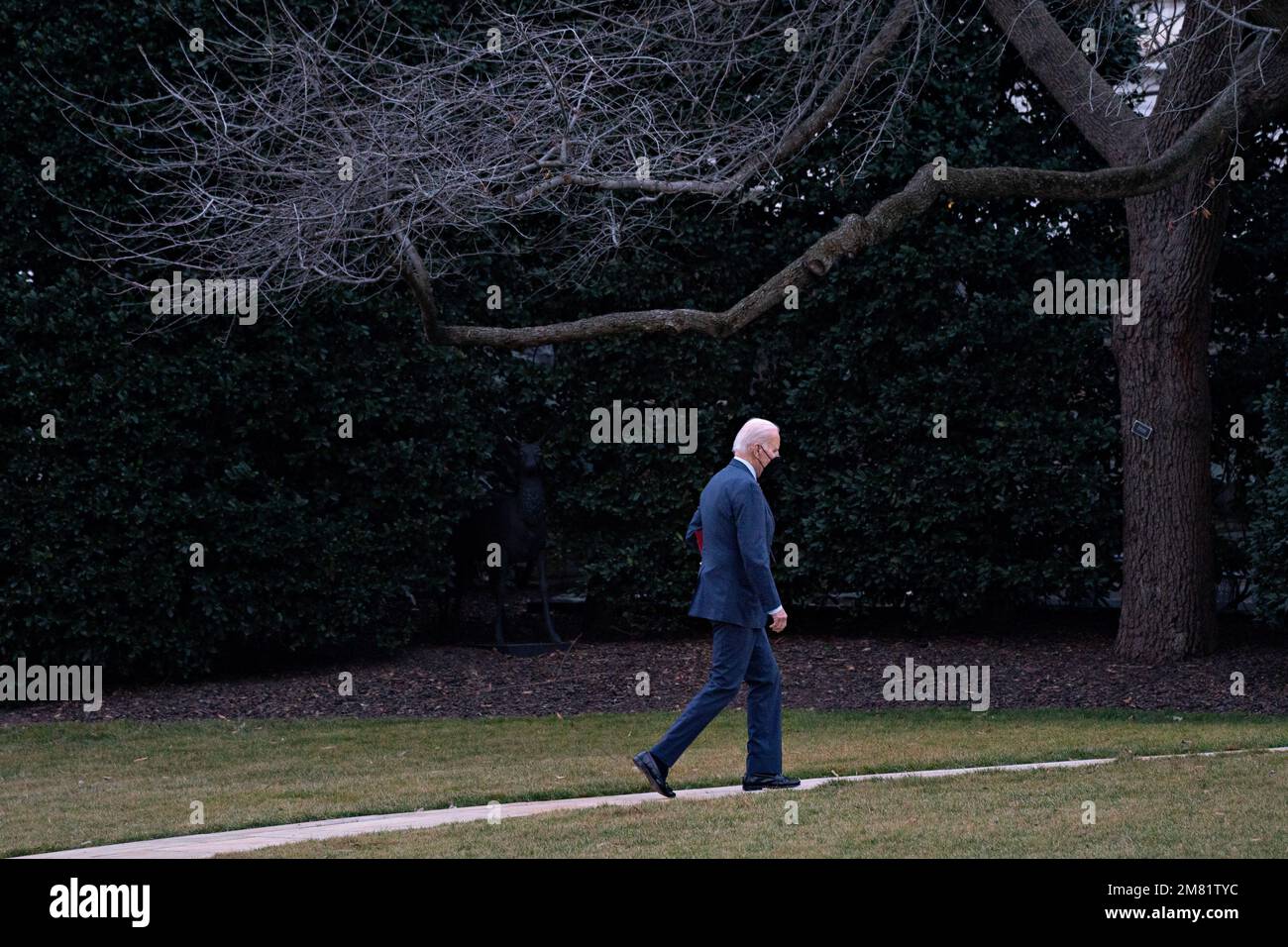 US President Joe Biden walks on the South Lawn of the White House ...