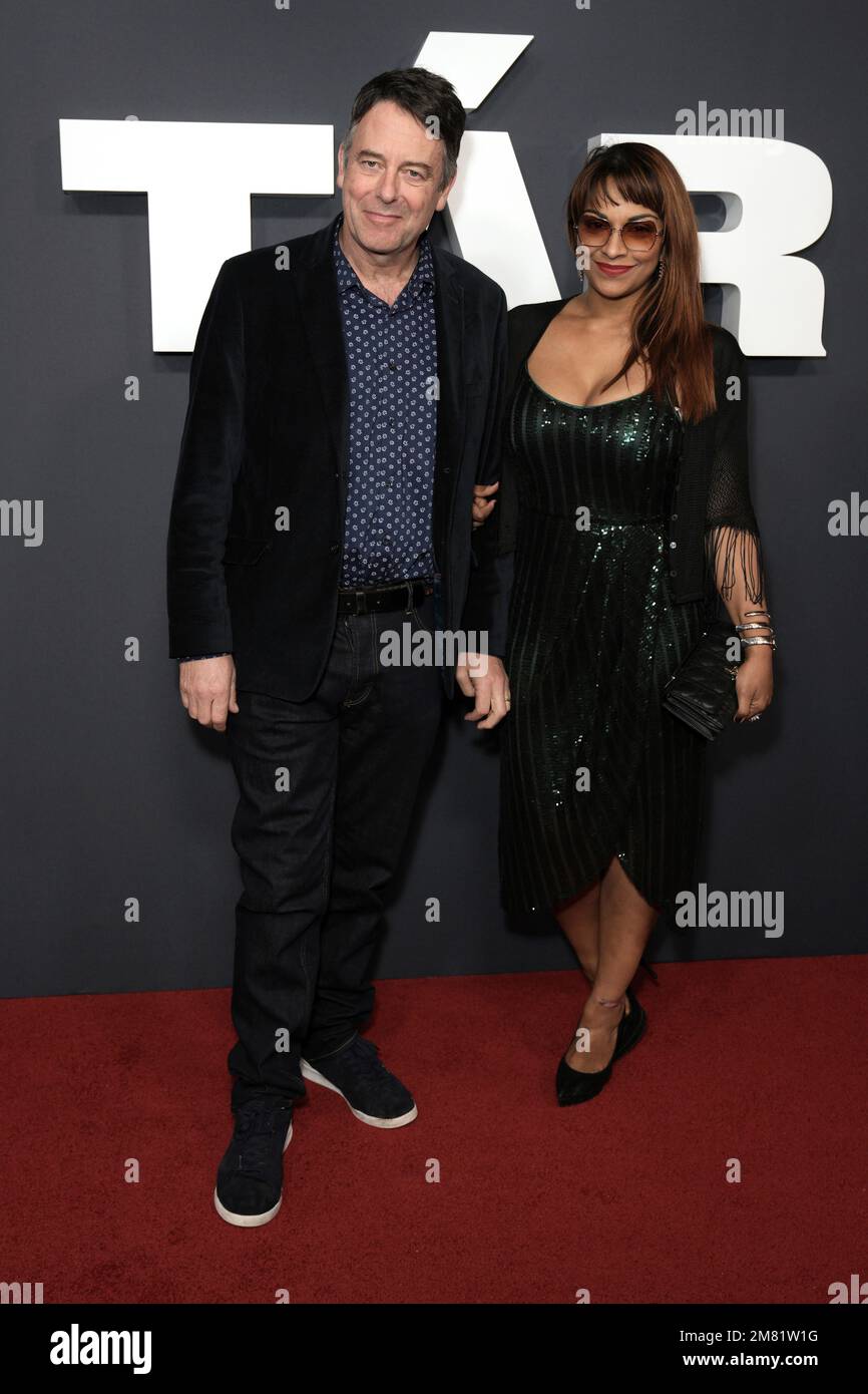Gus Christie, left, and Danielle de Niese pose for photographers upon ...