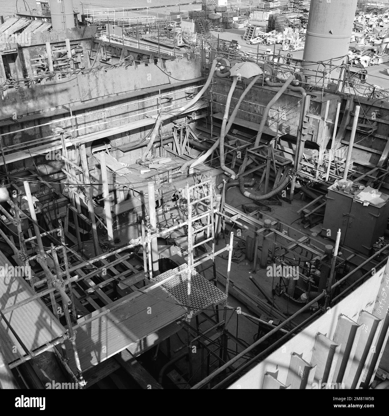 An interior view of the main engine room on the guided missile frigate ...