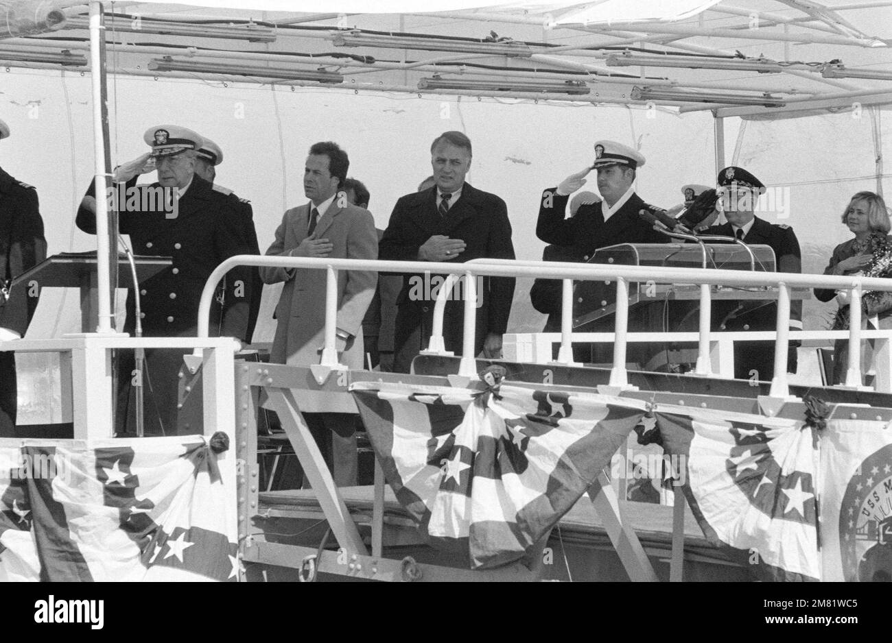 Guests saluting at the commissioning of the nuclear-powered attack ...