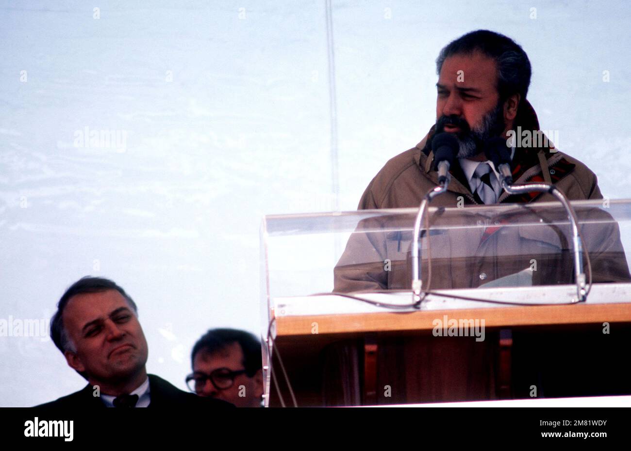 A distinguished guest speaks during the commissioning ceremony for the ...