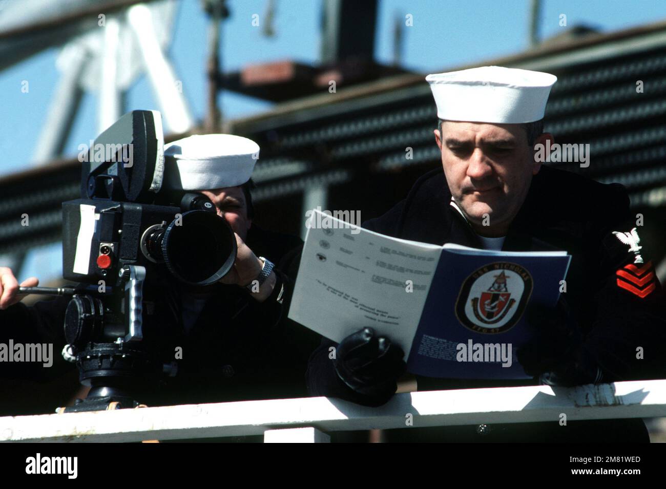 Navy cameraman film activities taking place during the commissioning ...