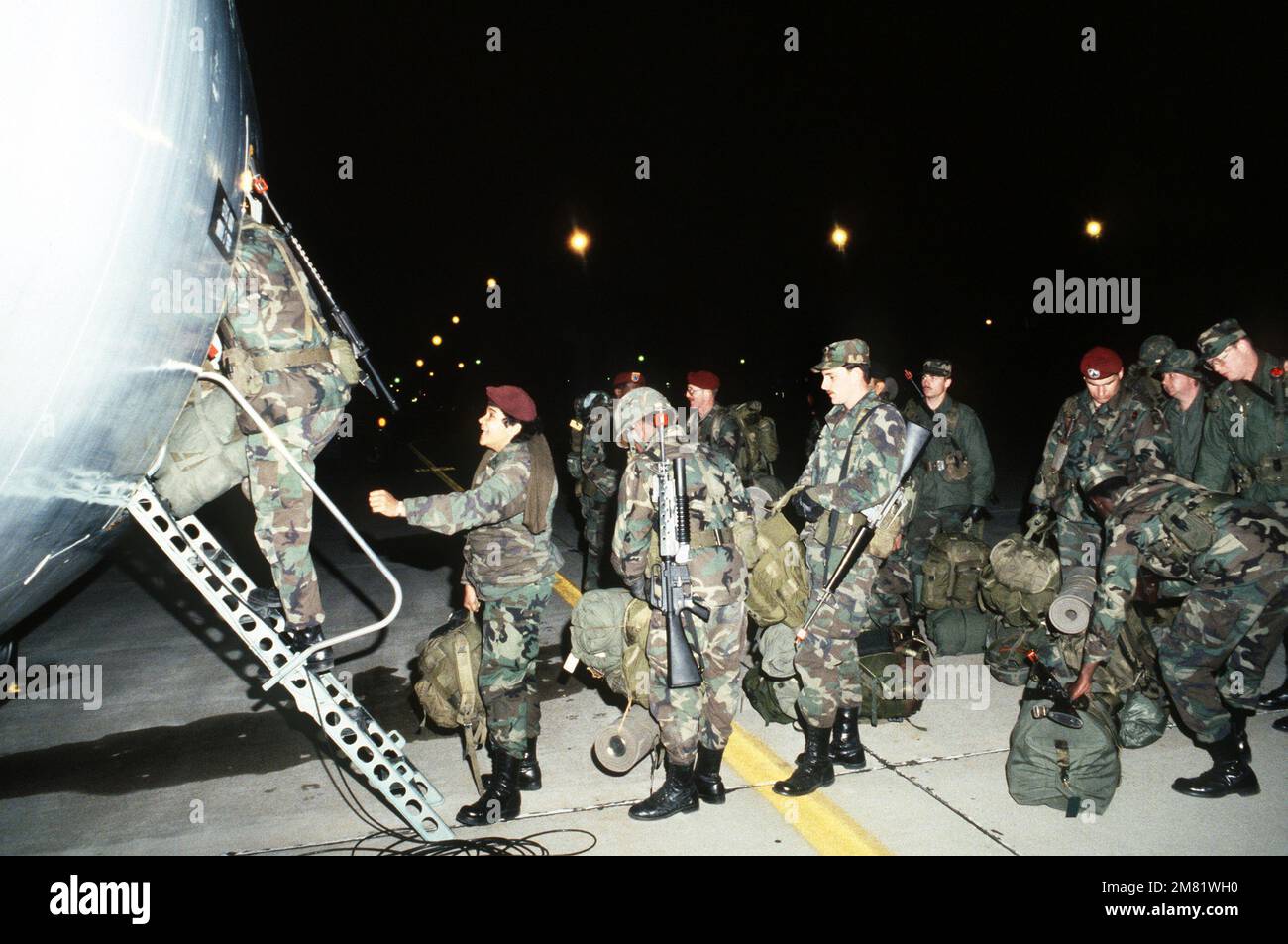 Members of Company B, 319th Military Intelligence Battalion, board a C ...