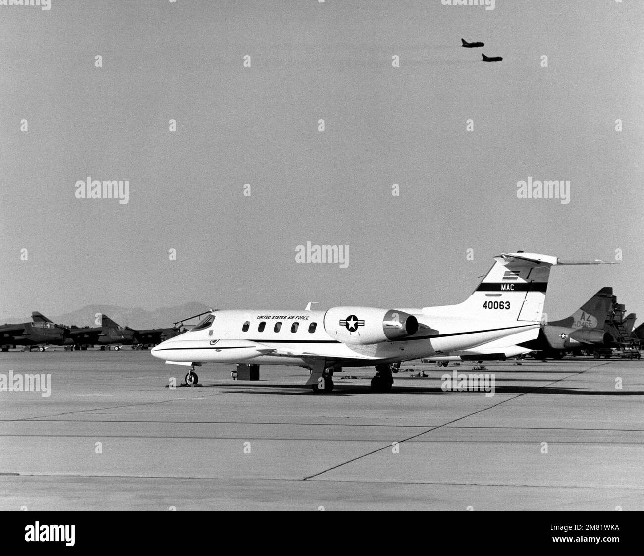 A left side view of a Military Airlift Command C-21A Learjet aircraft ...