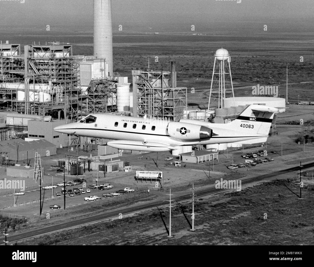 An air-to-air left side view of a Military Airlift Command C-21A ...