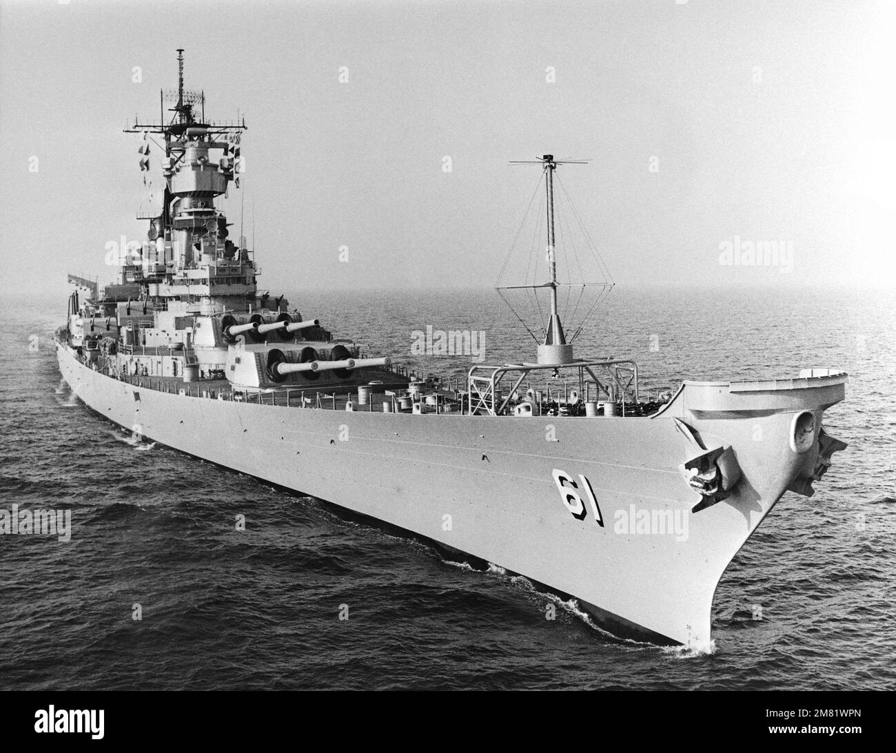 A starboard bow view of the battleship USS IOWA (BB 61) underway during sea trials. Country ...