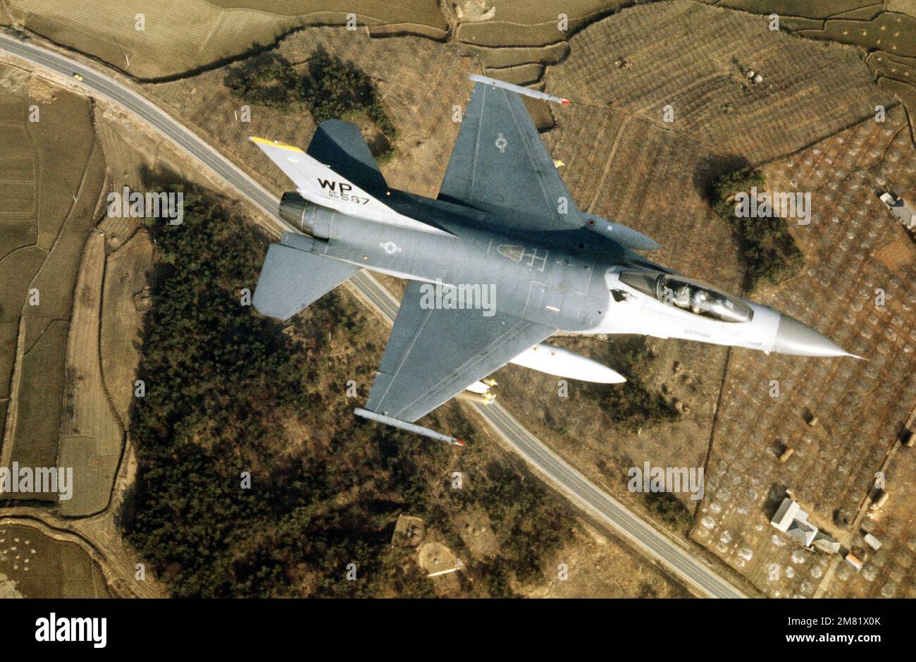 An air-to-air overhead view of an 80th Tactical Fighter Squadron F-16 ...
