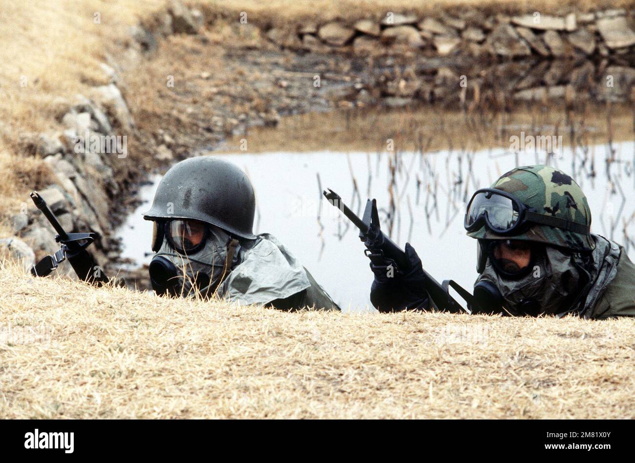 Members of the 51st Security Police Squadron wear nuclear, biological ...