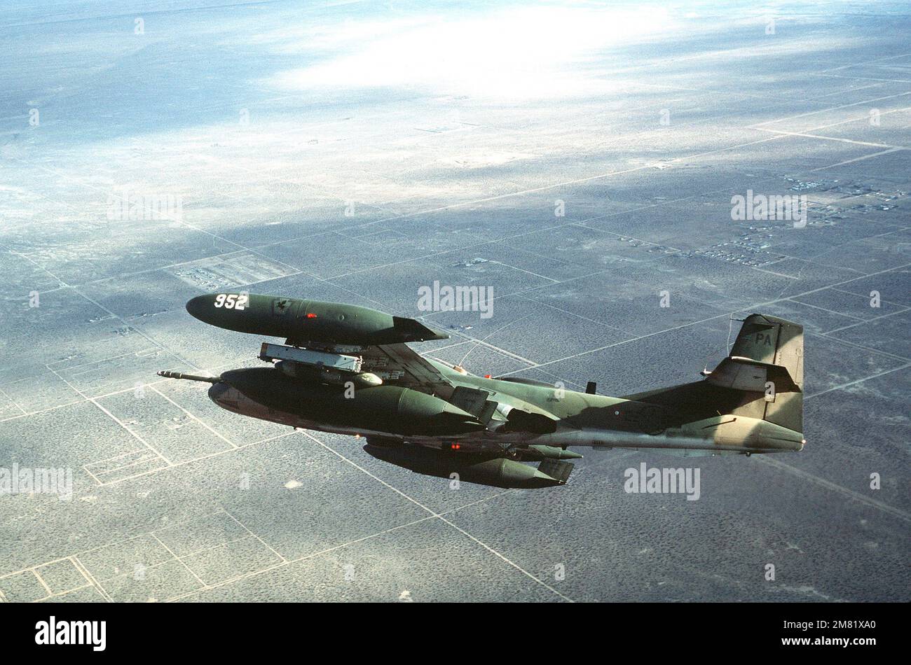 An air-to-air left side view of an A-37 Dragonfly aircraft in use ...