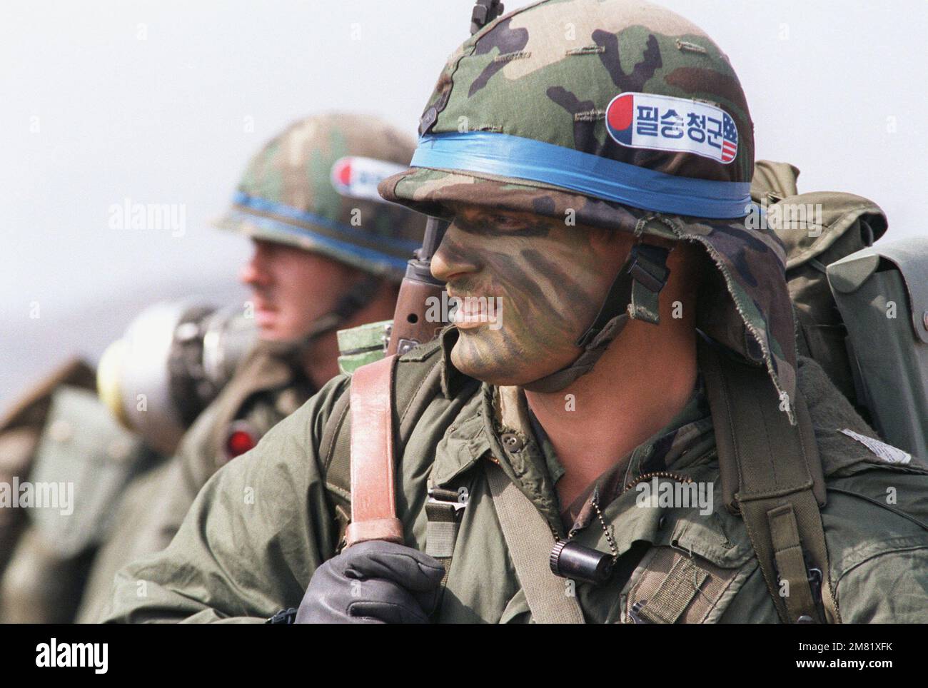 A member of the 1ST Battalion, 32nd Infantry, participates in the joint ...