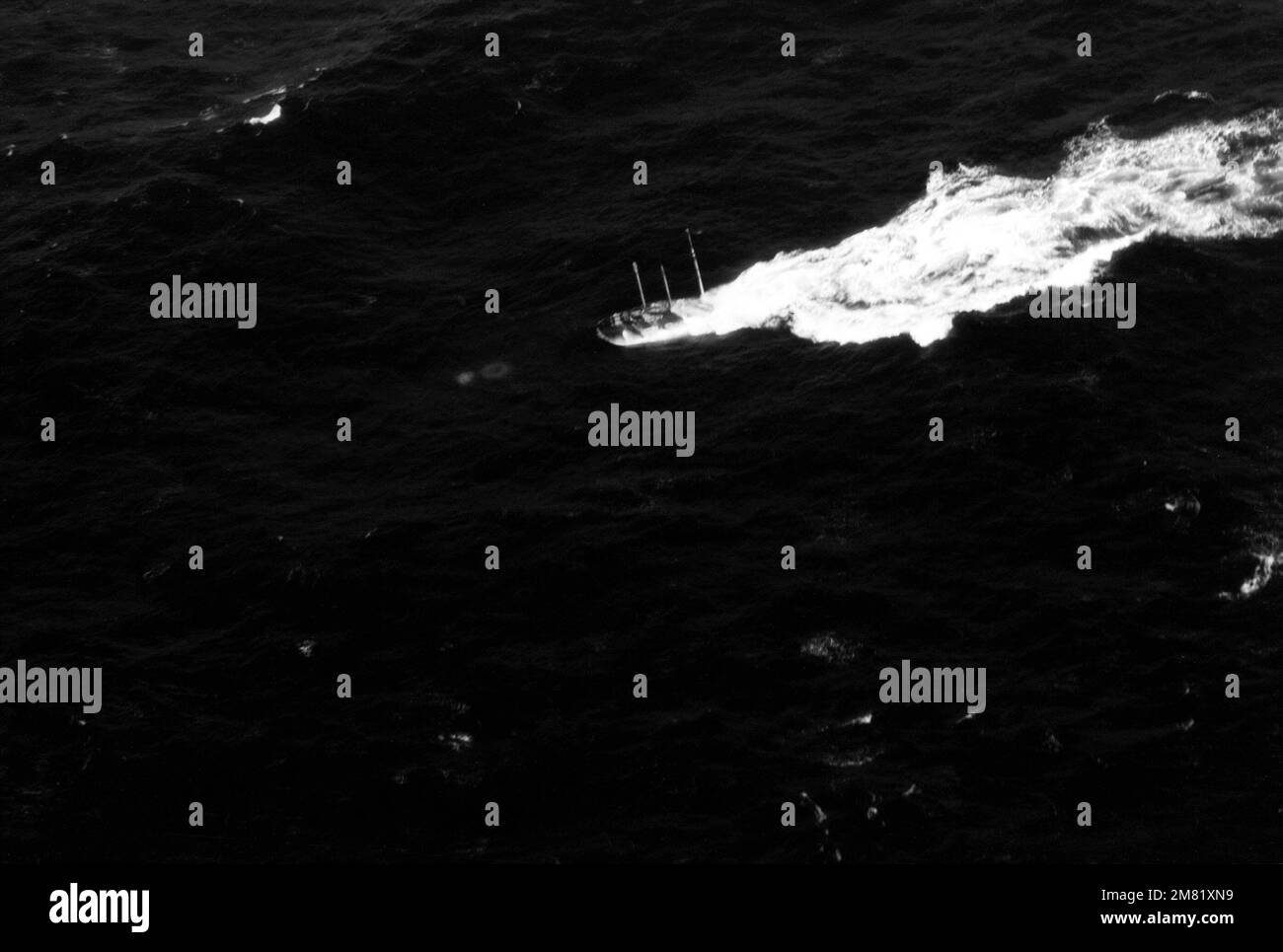 An aerial port side view of a Soviet "Victor I" class submarine ...