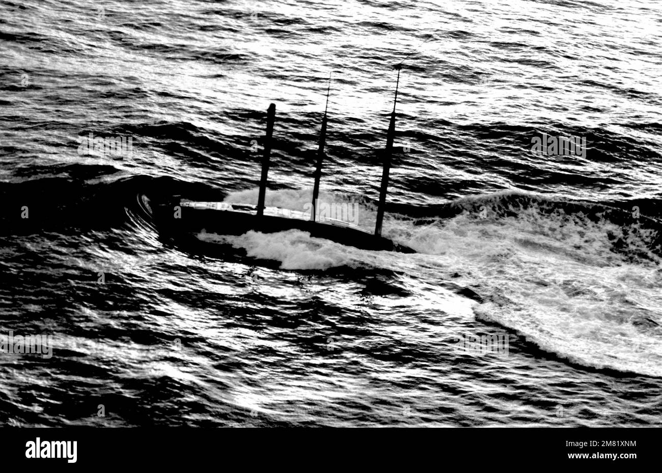 An aerial port side view of a Soviet "Victor I" class submarine ...