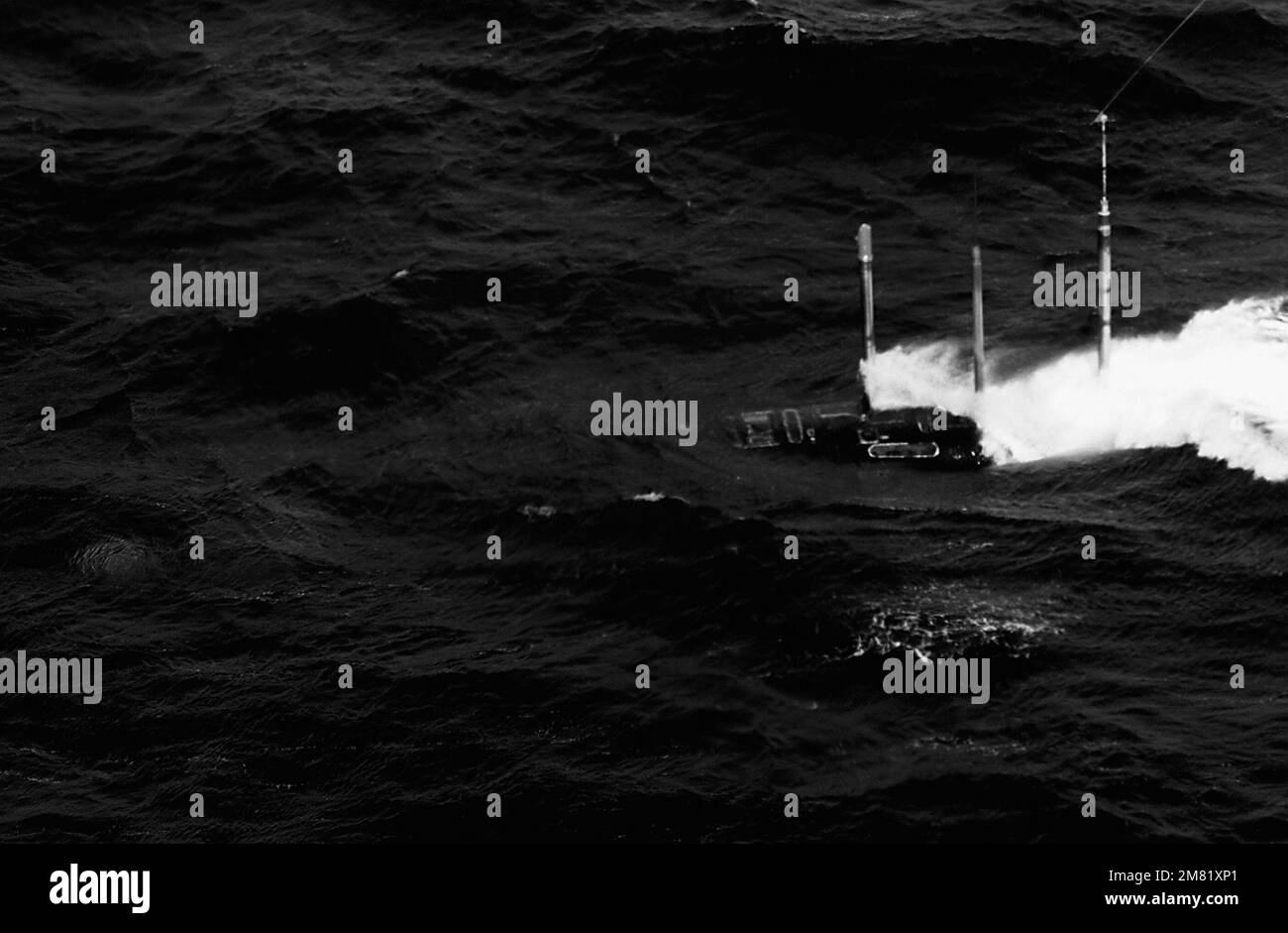 An aerial port side view of a Soviet "Victor I" class submarine ...