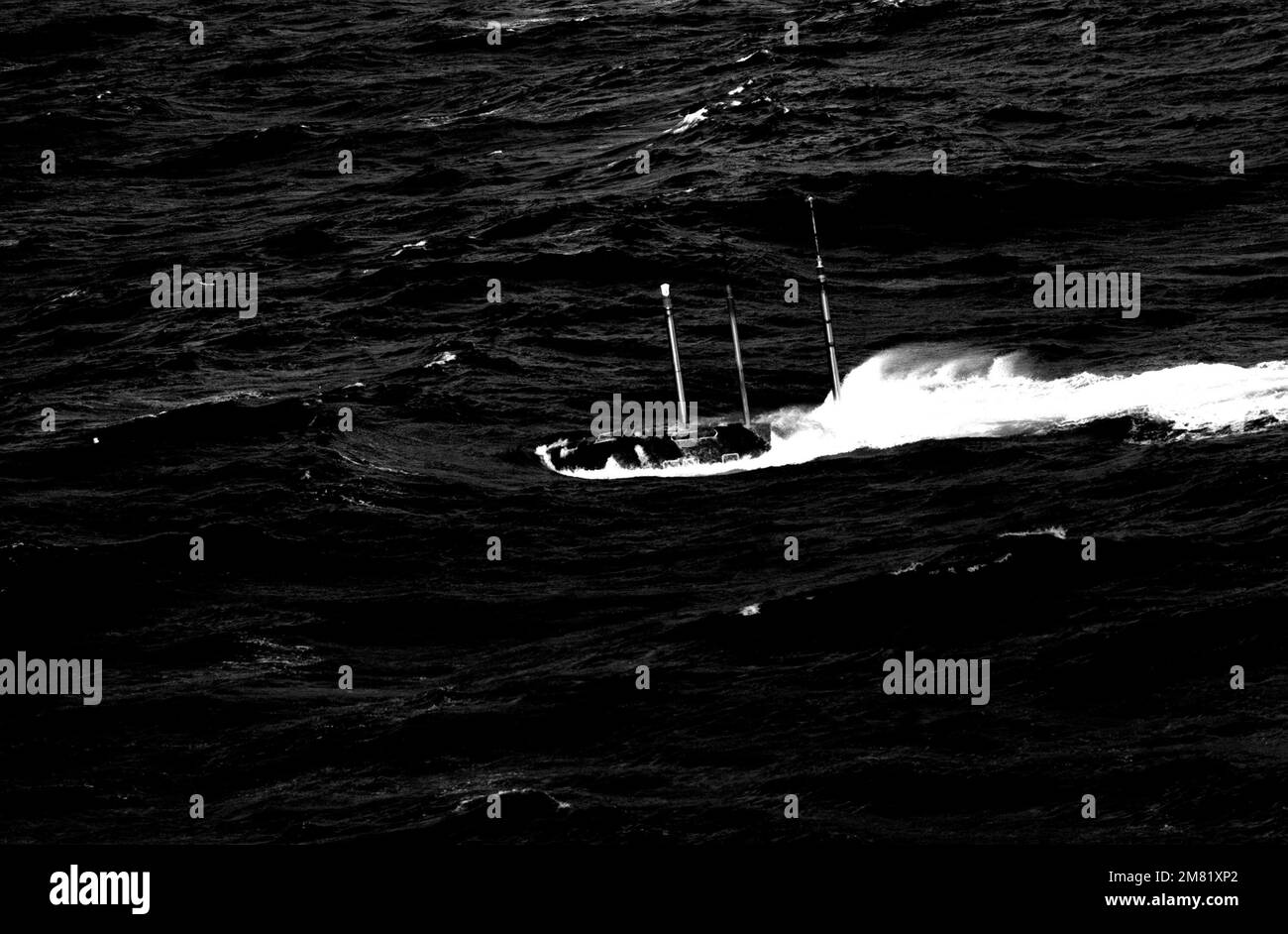 An aerial port side view of a Soviet "Victor I" class submarine ...