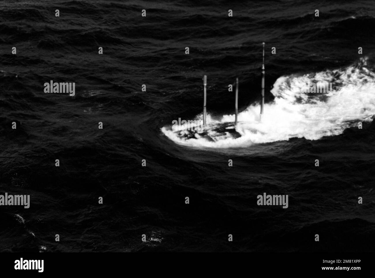 An aerial port side view of a Soviet "Victor I" class submarine ...