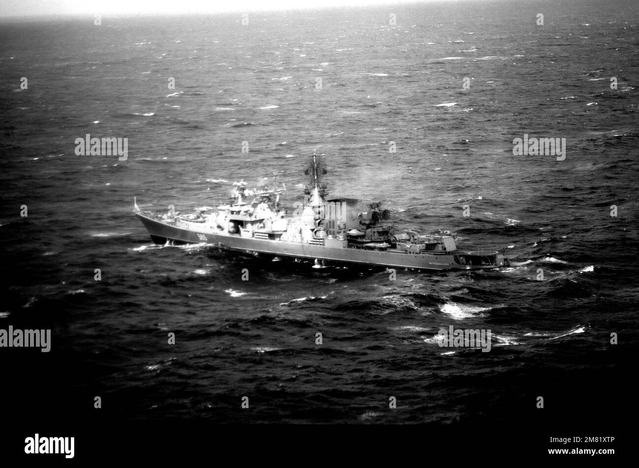 An aerial port quarter view of a Soviet "Kara" class guided missile ...