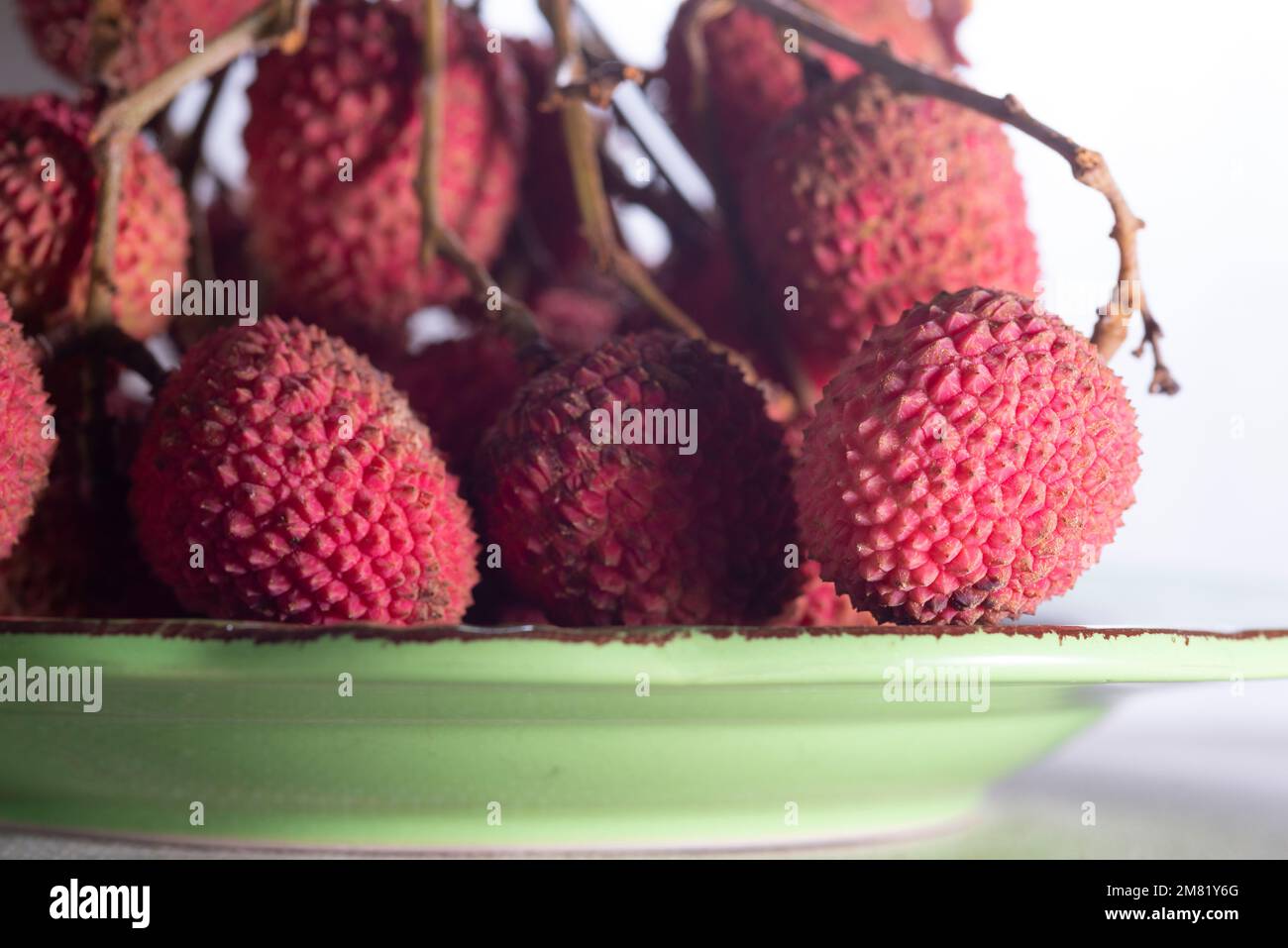 Lychees on Ceramic Plate Stock Photo - Alamy