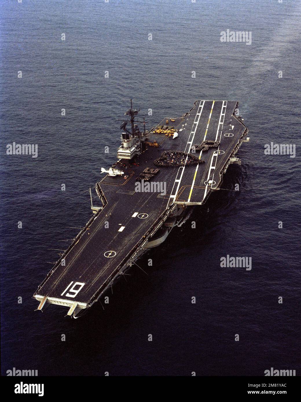 An aerial port bow view of the aircraft carrier USS RANGER (CV 61 ...