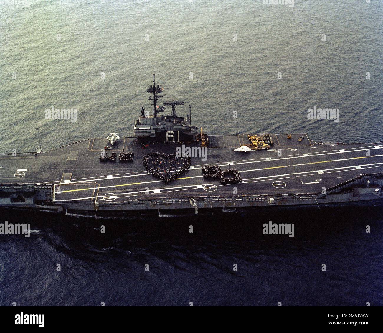 An aerial port view of the aircraft carrier USS RANGER (CV 61 ...