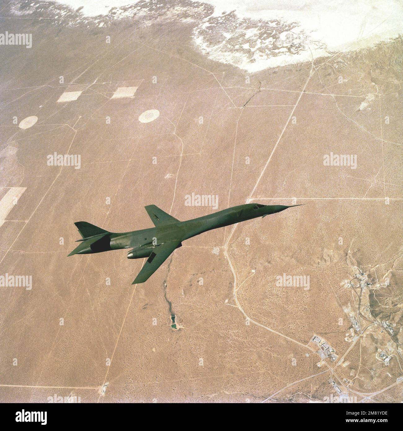An air-to-air right side view of the B-1B bomber prototype aircraft in ...