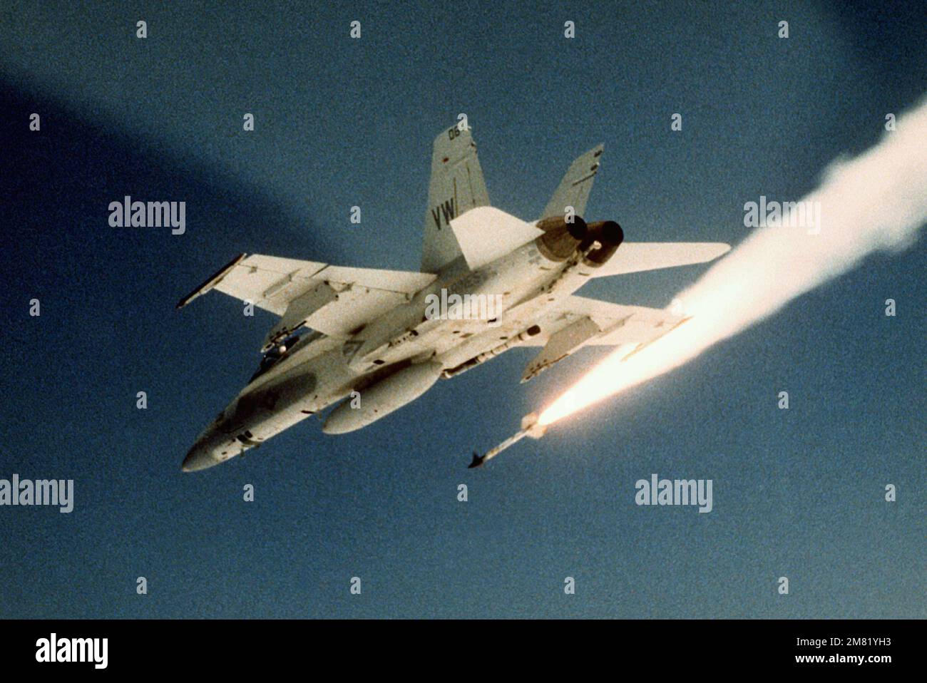 Bottom left side air-to-air view of an F/A-18 Hornet strike fighter ...