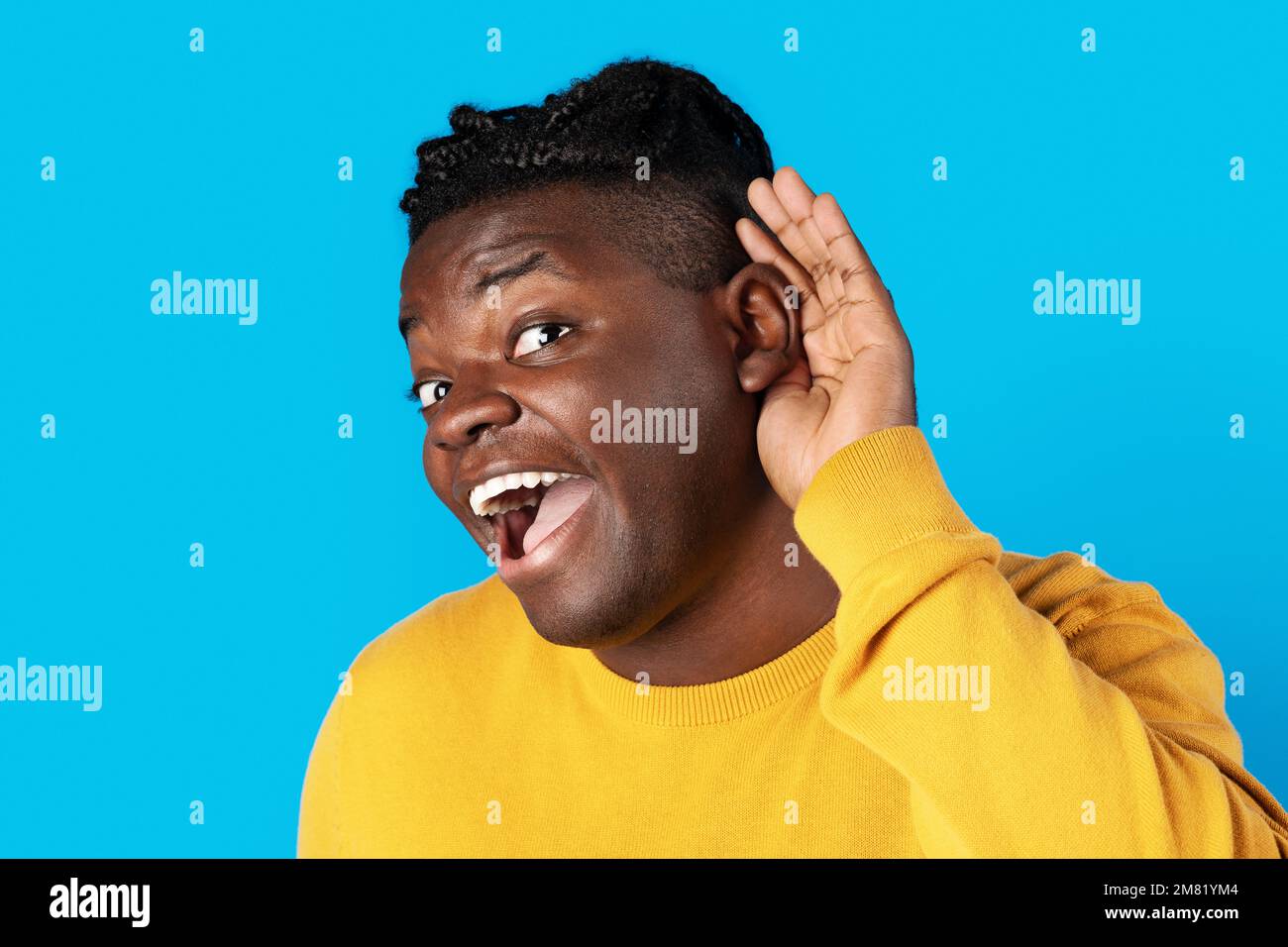 African american man holding ear hi-res stock photography and images ...