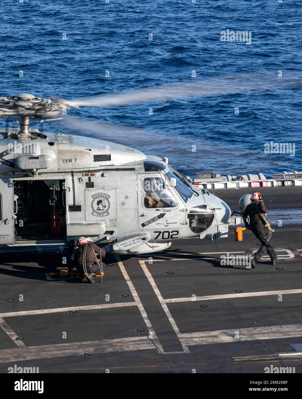 230107-N-EL850-3124 IONIAN SEA (Jan. 7, 2023) Sailors chock and chain ...