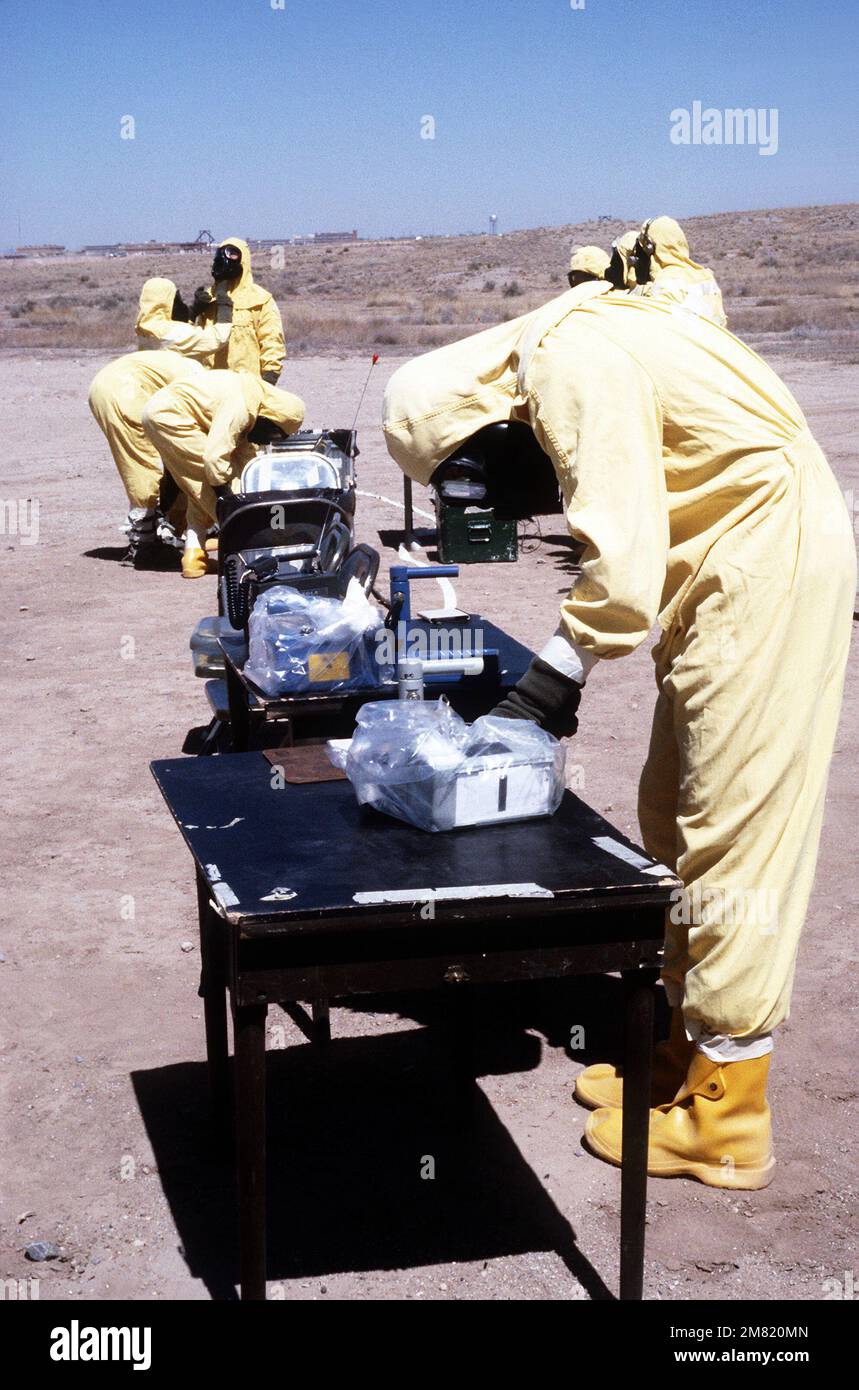 MASTER SGT. James Holcomb, wearing nuclear biological chemical (NBC ...