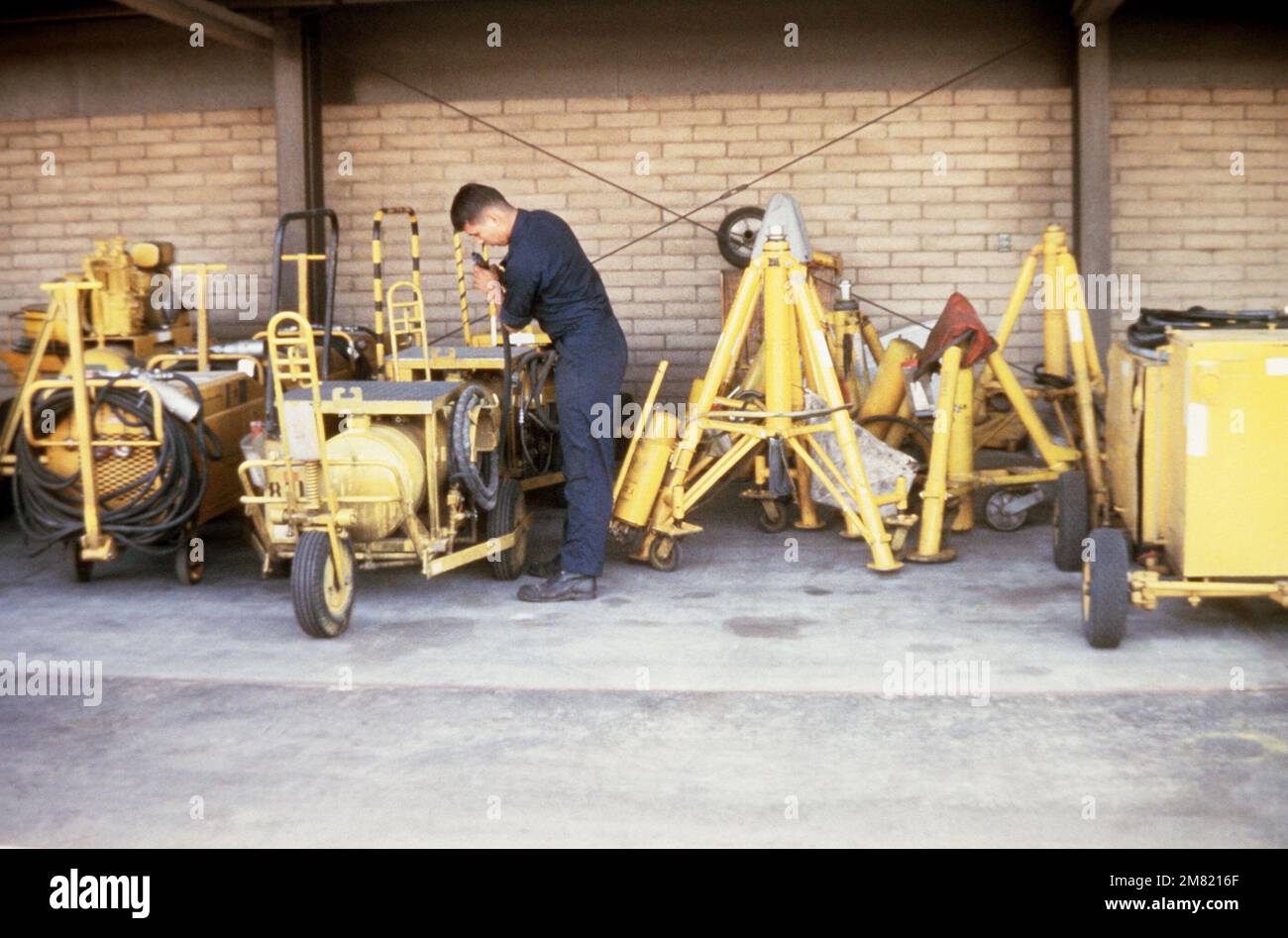 A member of the Aircraft Intermediate Maintenance Department (AIMD ...