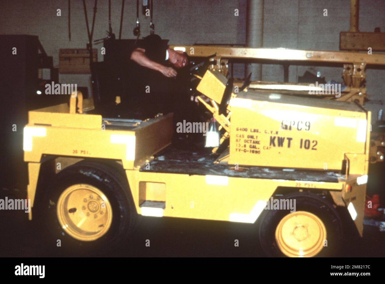 A member of the Aircraft Intermediate Maintenance Department (AIMD ...