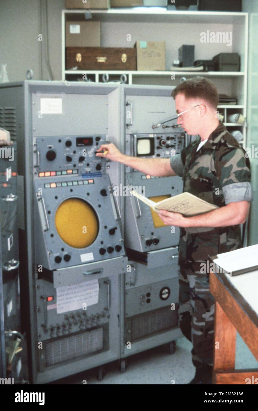 Sergeant Montgomery preforms an operational check on an FPS-106V ...