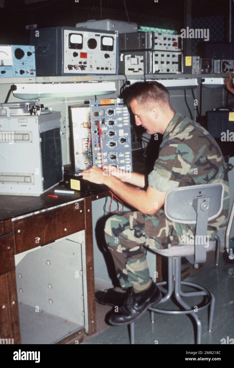 A member of the Aircraft Intermediate Maintenance Department (AIMD ...