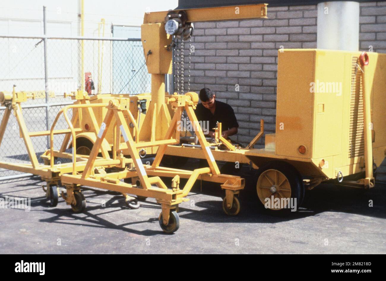 A member of the Aircraft Intermediate Maintenance Department (AIMD ...