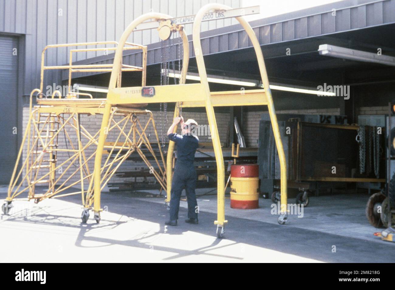 A member of the Aircraft Intermediate Maintenance Department (AIMD ...
