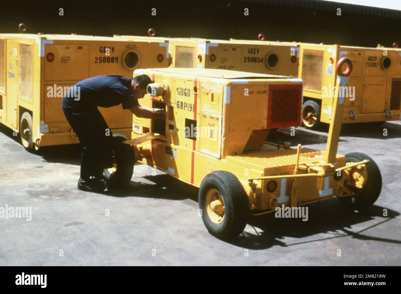 A member of the Aircraft Intermediate Maintenance Department (AIMD ...