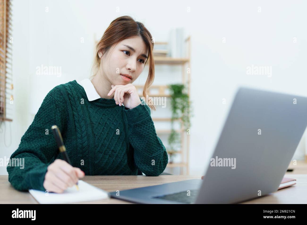 business owner or Asian male marketers are using business phones in ...