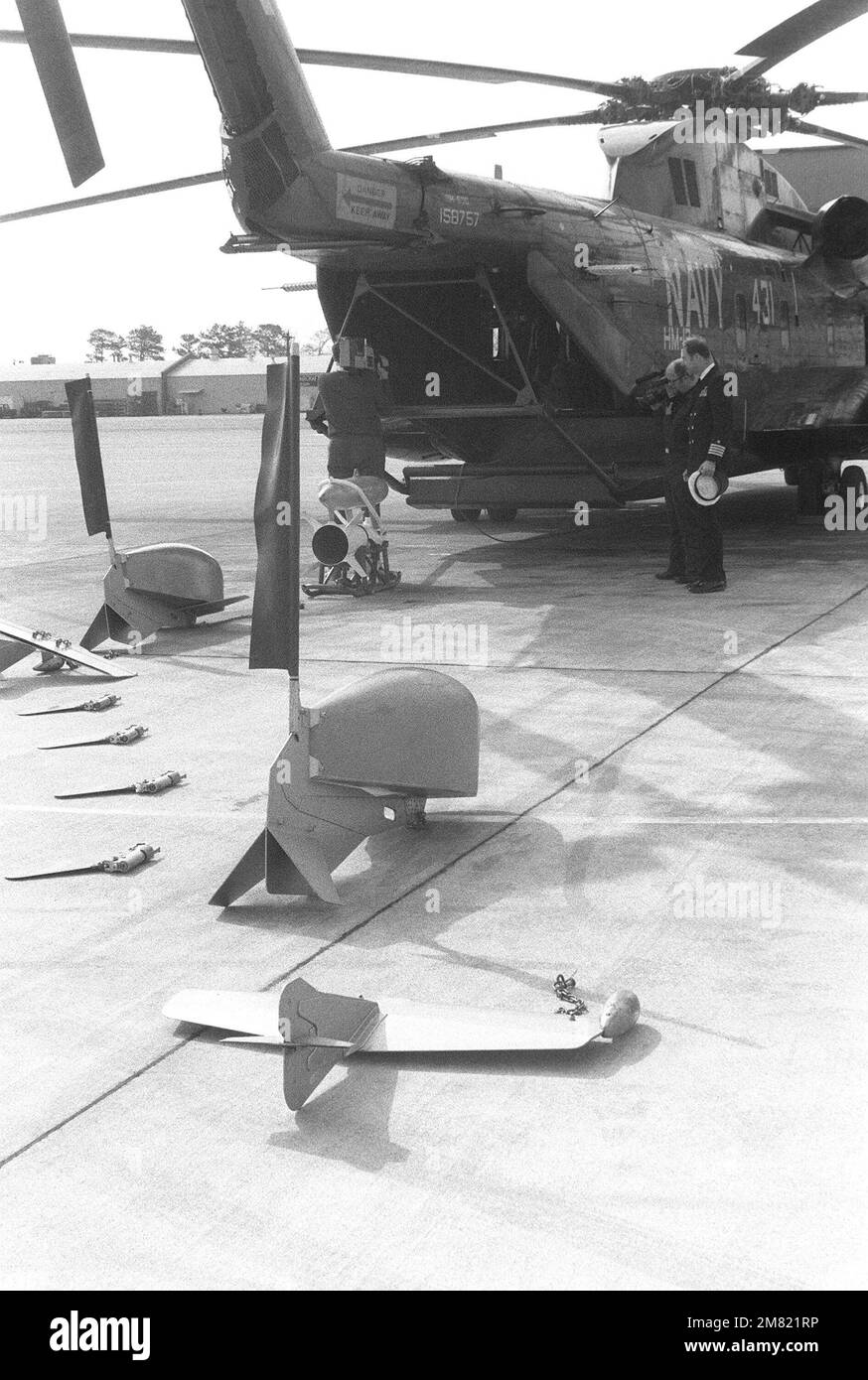 Cameramen record activities taking place on the flight line as an RH ...