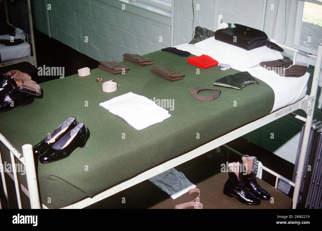 The bunk of a recruit from the Woman Recruit Training Command is ready ...